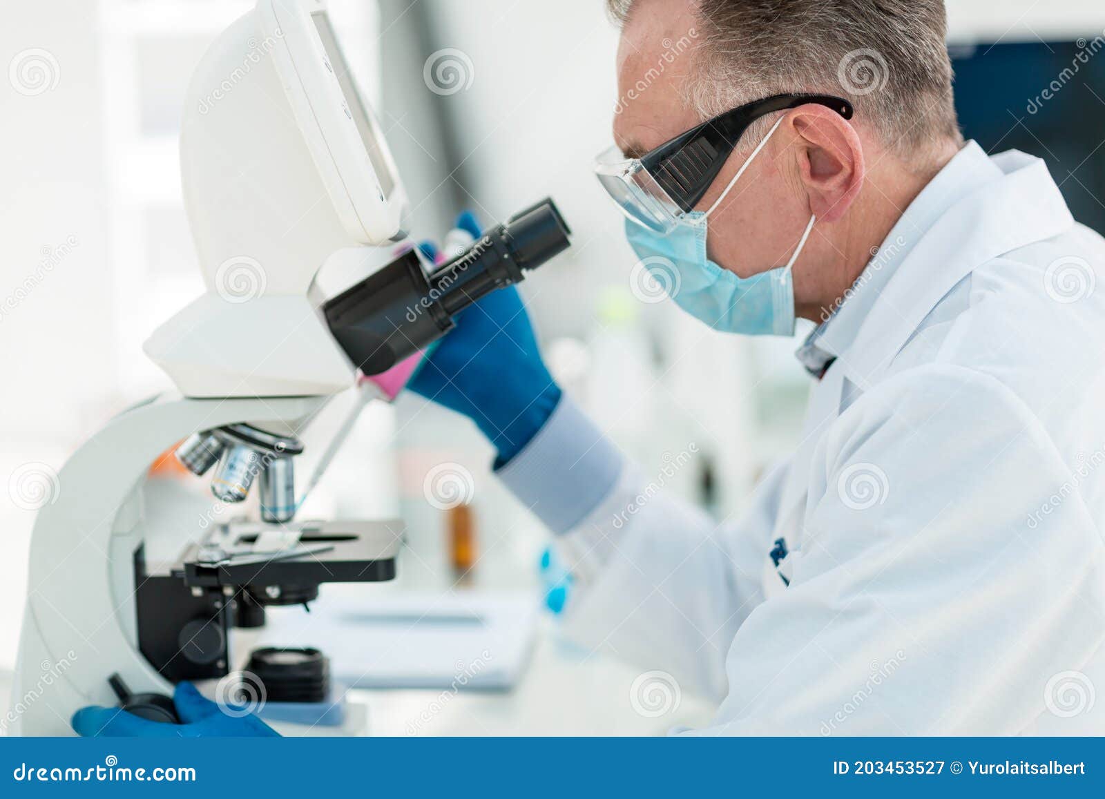 Close Up. Microbiologist a Scientist Looking through a Microscope Stock ...