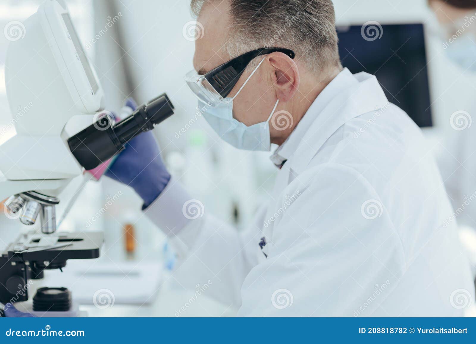 Close Up. Microbiologist a Scientist Looking through a Microscope Stock ...