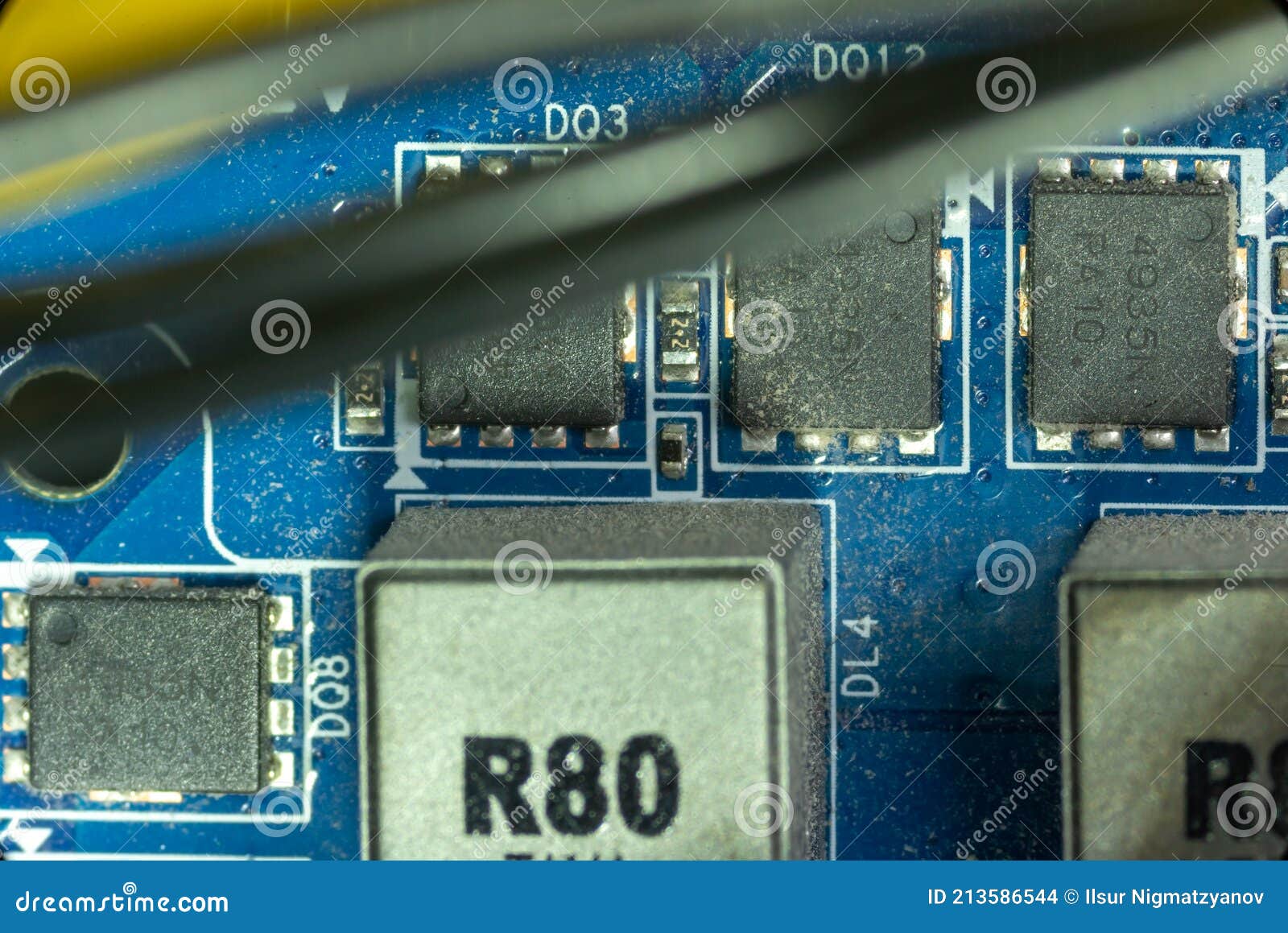 Close-up of Microcircuits and Transistors on a Motherboard in a ...