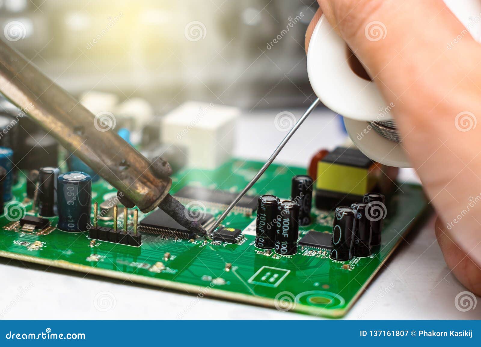 Close Up of Microelectronics Engineering. Soldering Lead Repairing ...