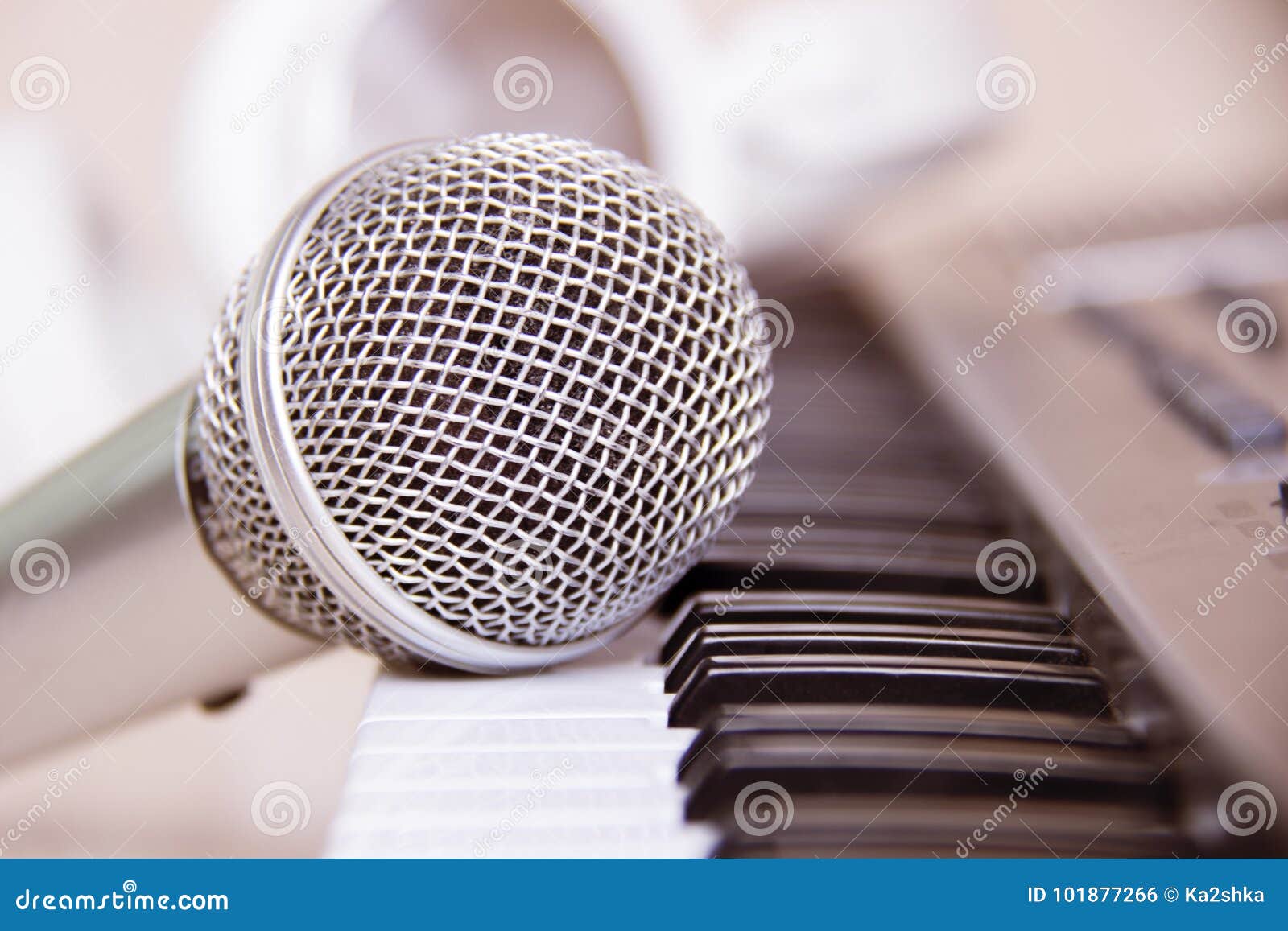 Close Up on a Microphone during Recording Session with a Singer, Piano ...