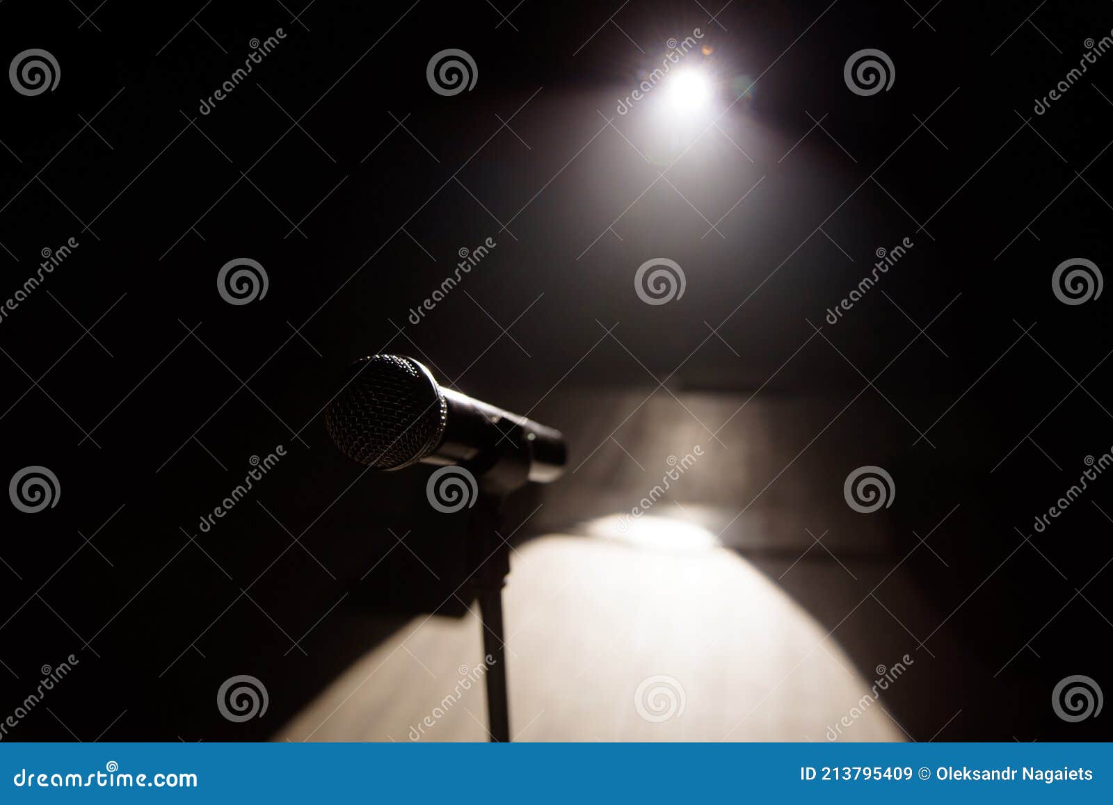 Close Up of Microphone on Stage in Black Background Stock Image - Image ...