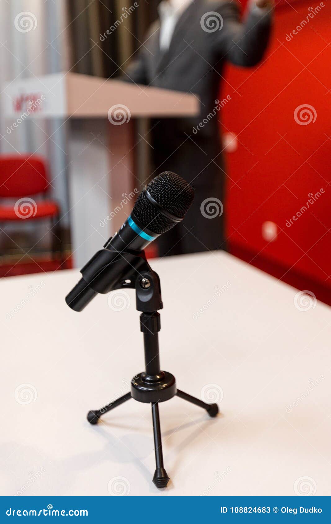 Close-up of a Microphone on a Table with Speaker Stock Image - Image of ...