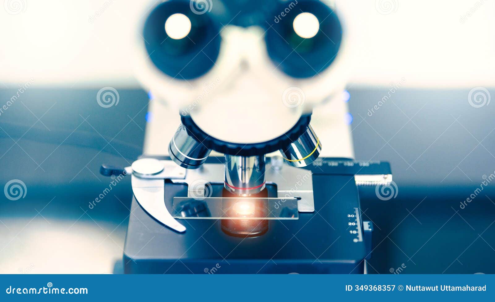 Close Up of Microscope with Test Sample in Medical Research Lab or ...