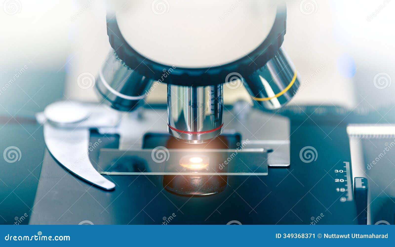 Close Up of Microscope with Test Sample in Medical Research Lab or ...