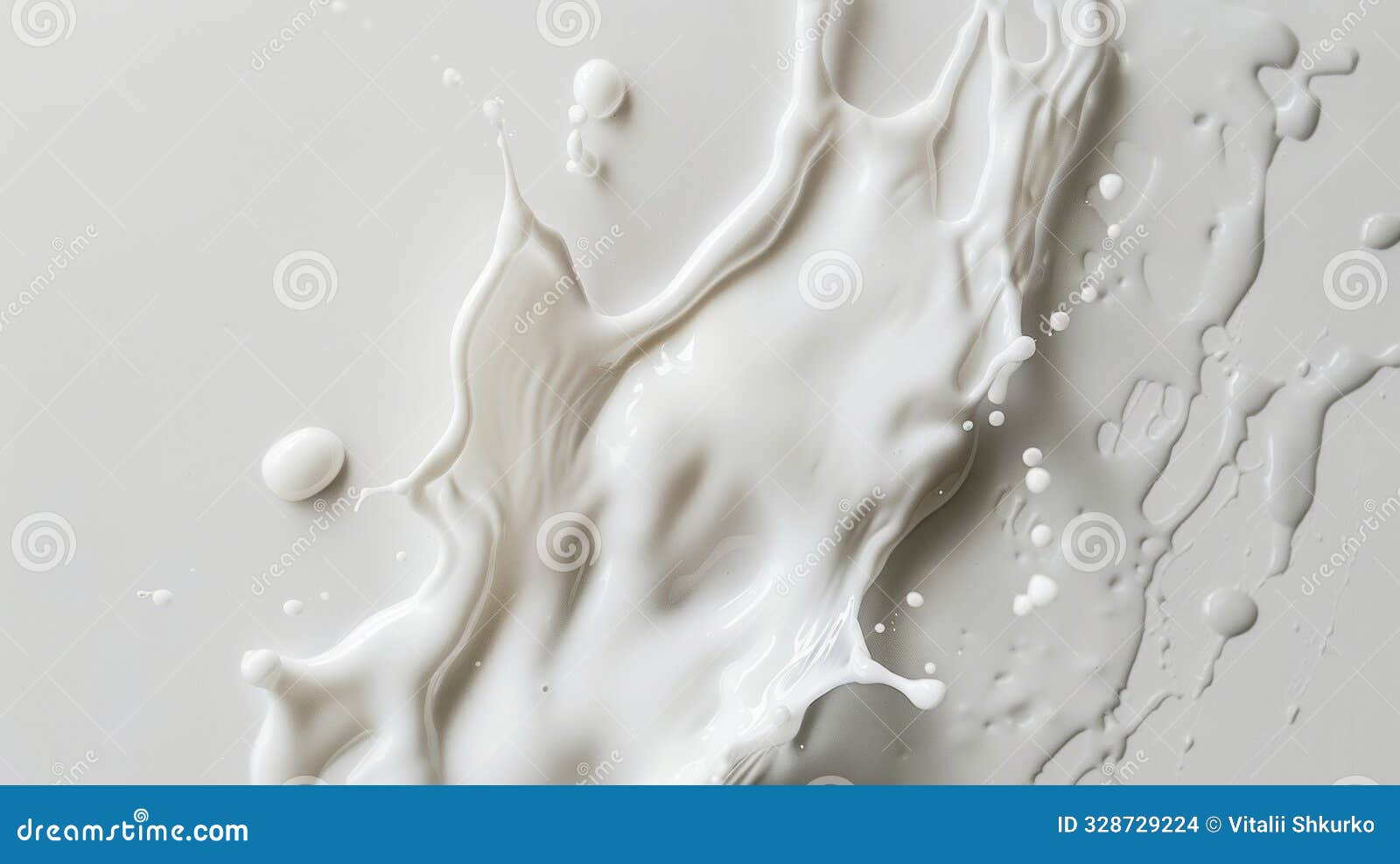 Close-up of Milk Splashing on a White Surface, Capturing Dynamic ...