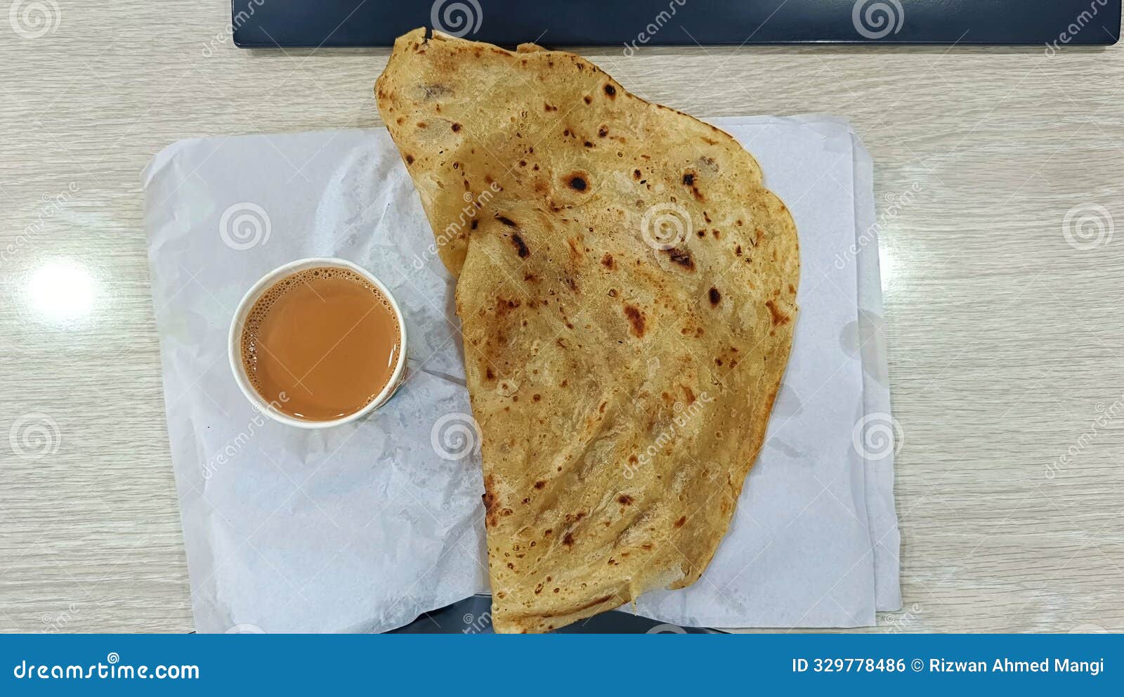 Close Up of Paratha and Milk Tea Karak Chai Tea Stock Photo - Image of ...