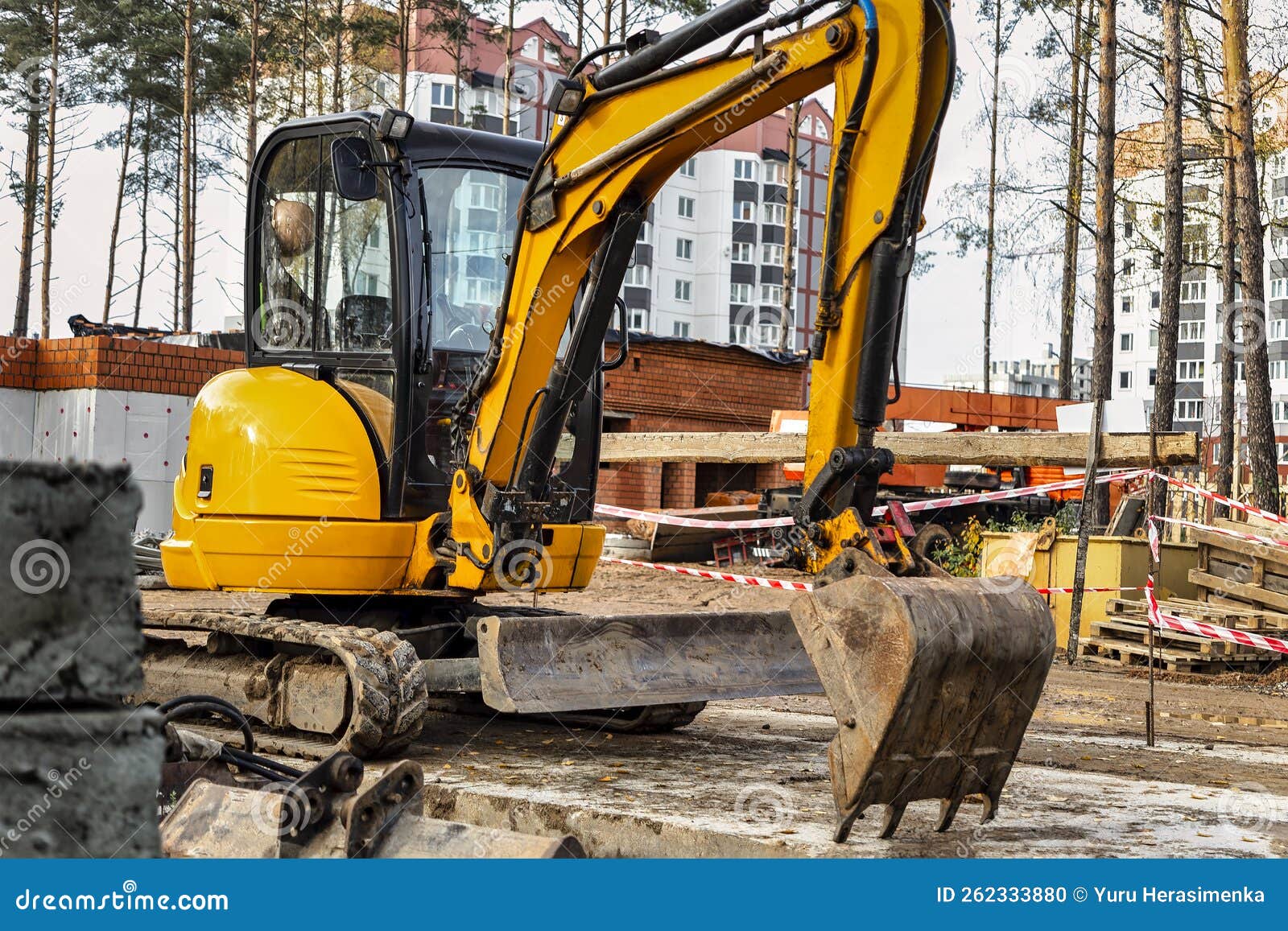 Close-up Mini Excavator during the Construction of a Modern Residential ...