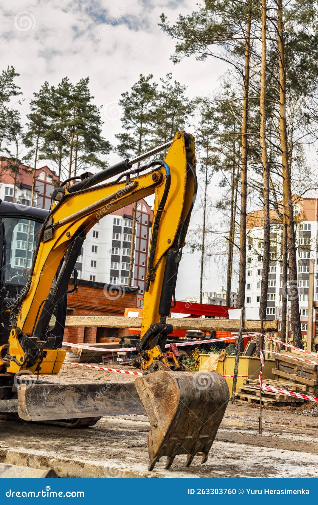 Close-up Mini Excavator during the Construction of a Modern Residential ...