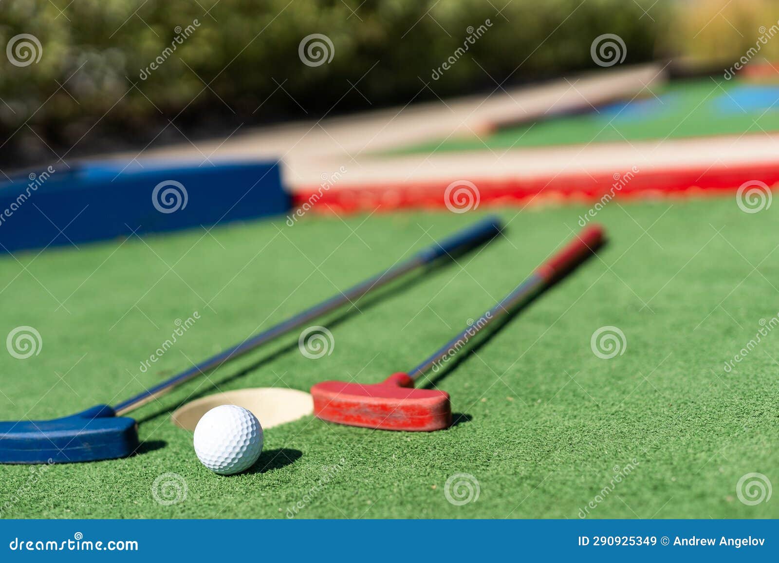 Close-up of Miniature Golf Hole with Bat and Ball Stock Image - Image ...