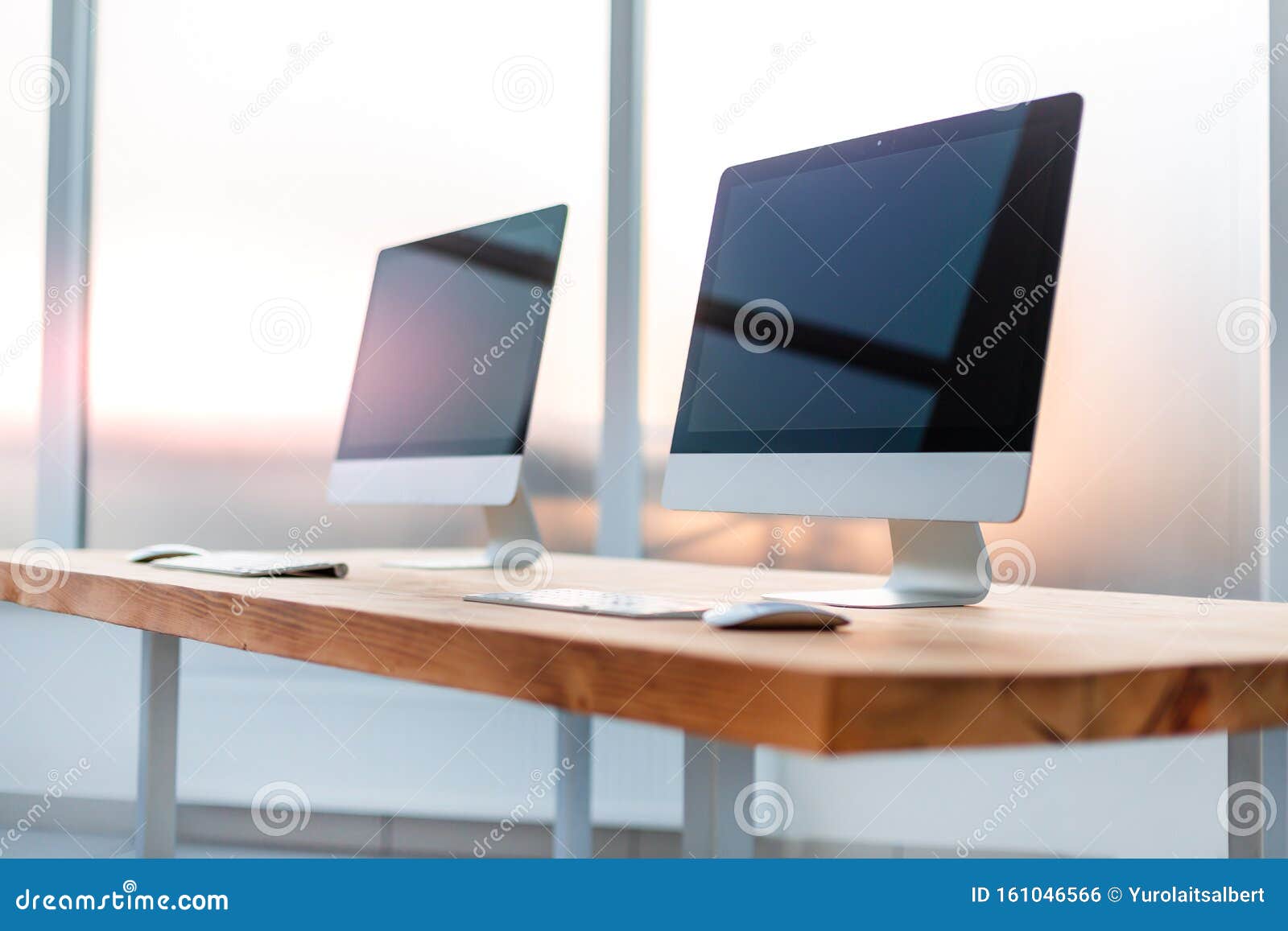 Close Up. Modern Computers on a Wooden Table Stock Photo - Image of ...