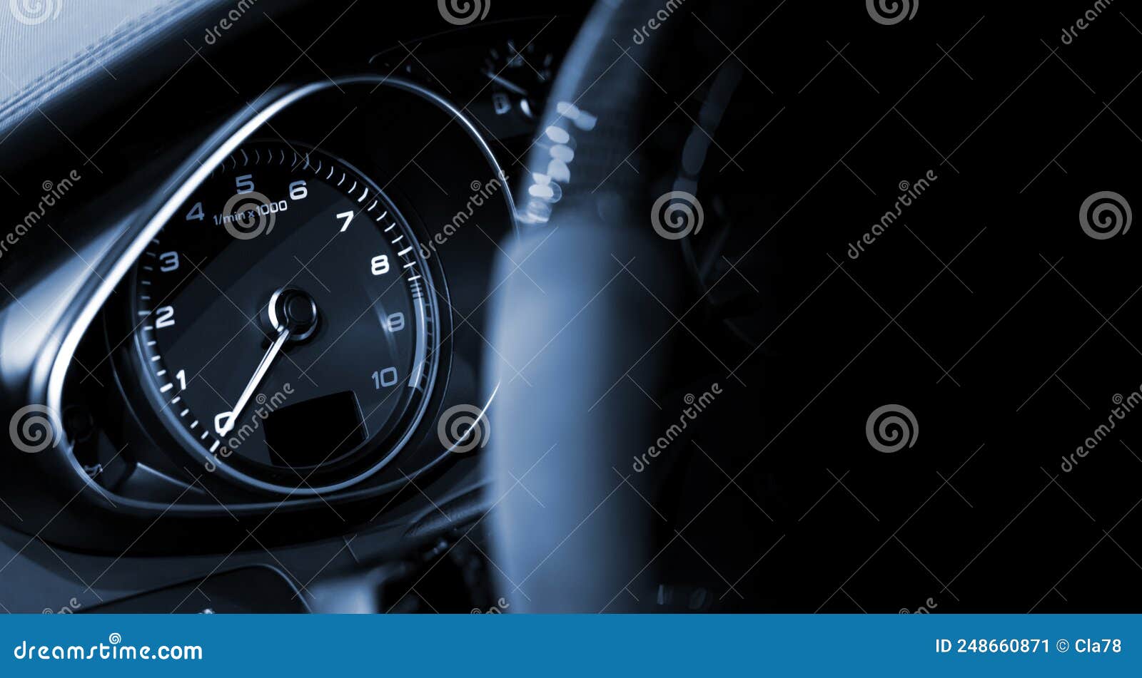 Close-up Of The Dashboard, Speedometer, Tachometer And Steering Wheel ...