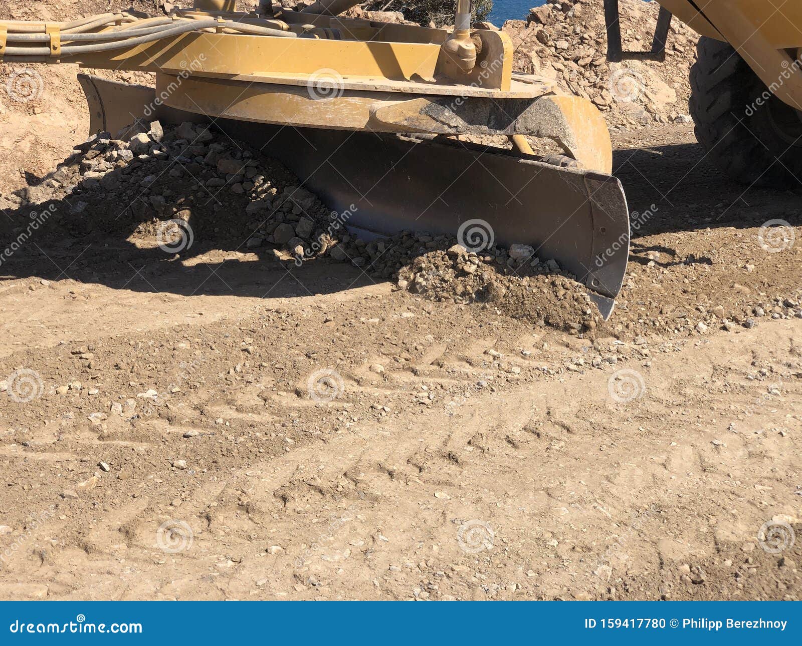 Close-up Of Moldboard Planning Road Surface. Blade Of Motor Grader ...