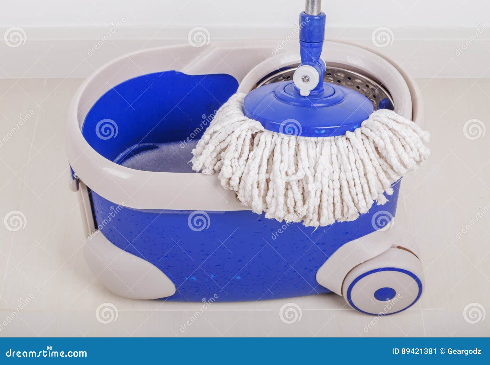 Close Up of Mop and Blue Bucket for Cleaning Floor Stock Image - Image ...