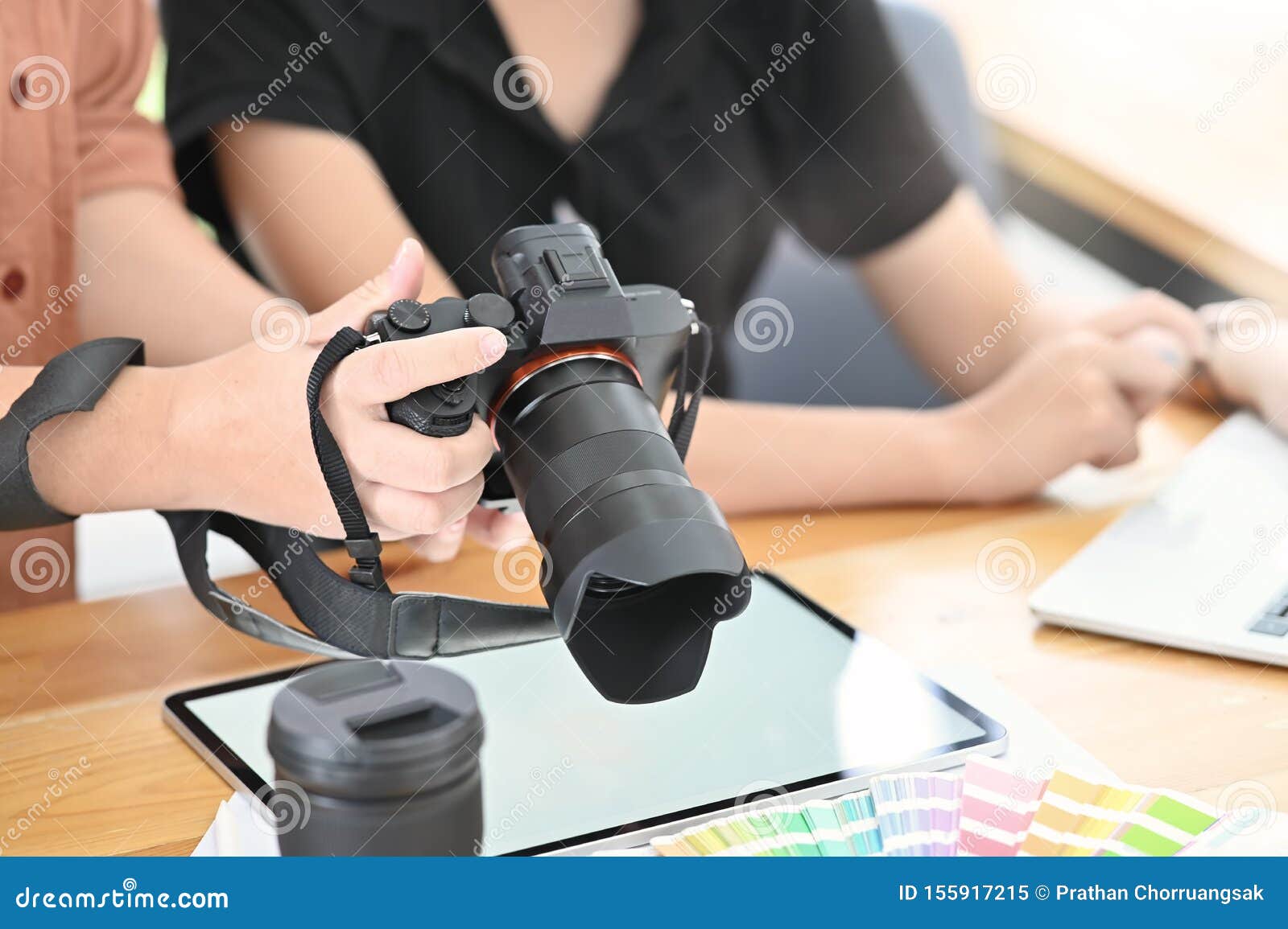 Close-up Motivated of Photographers Checking they Camera in they Modern ...