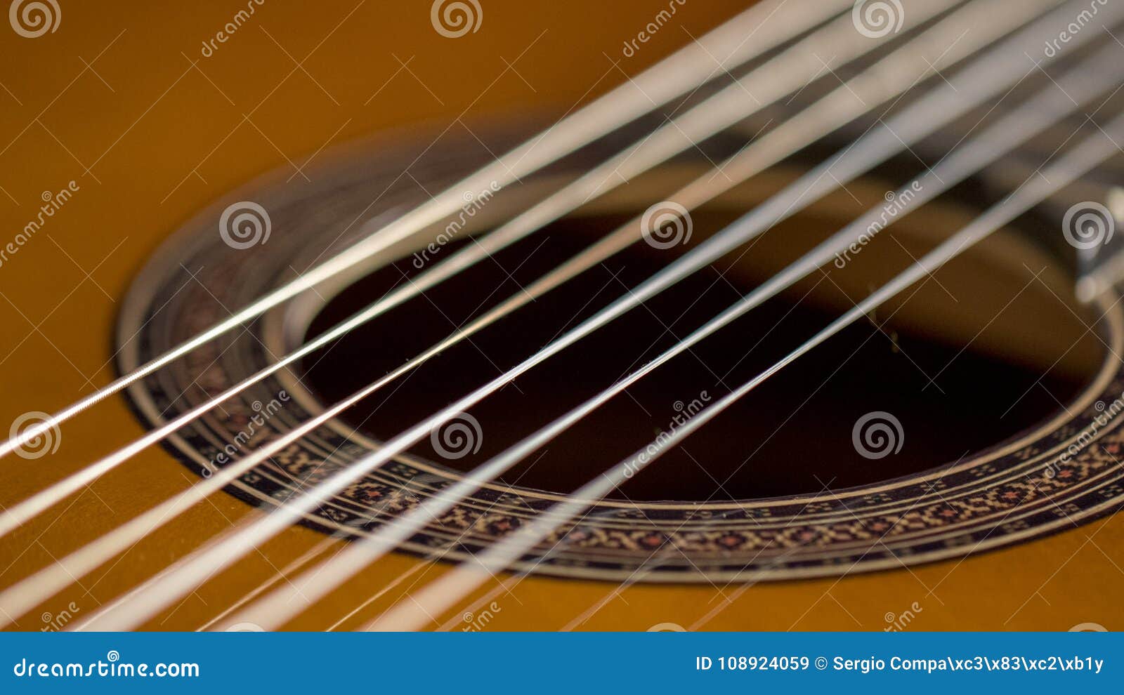Close-up of the Strings of a Classical Acoustic Guitar Stock Image ...