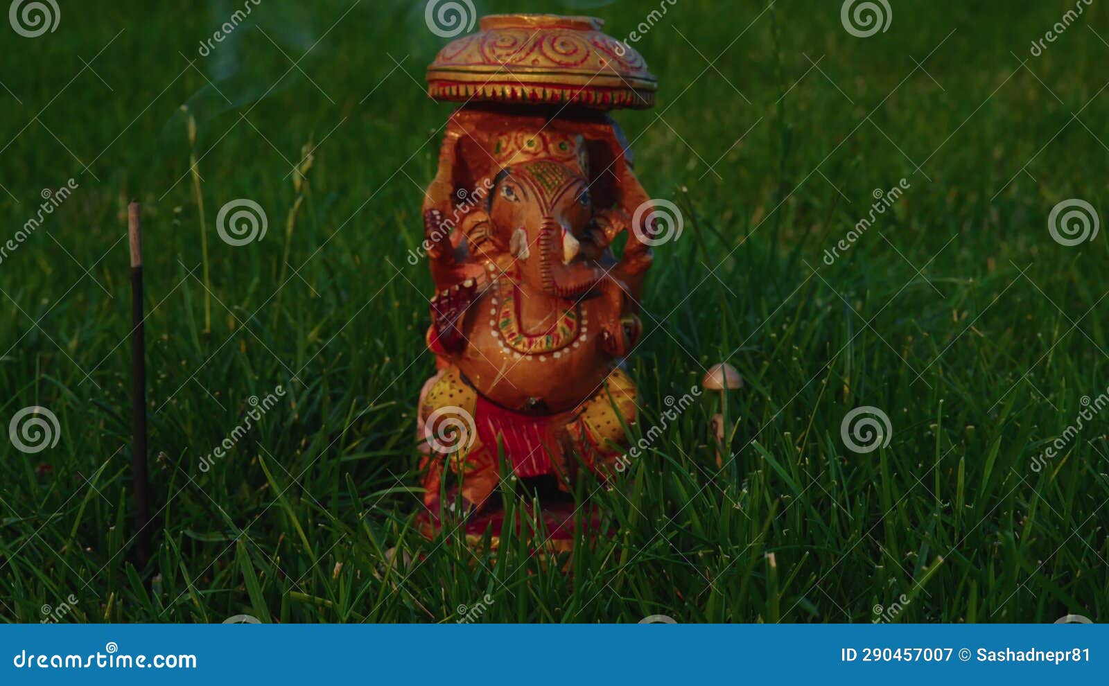 Close-up, Moving Forward, Ganesha Standing in the Grass with a Row of ...