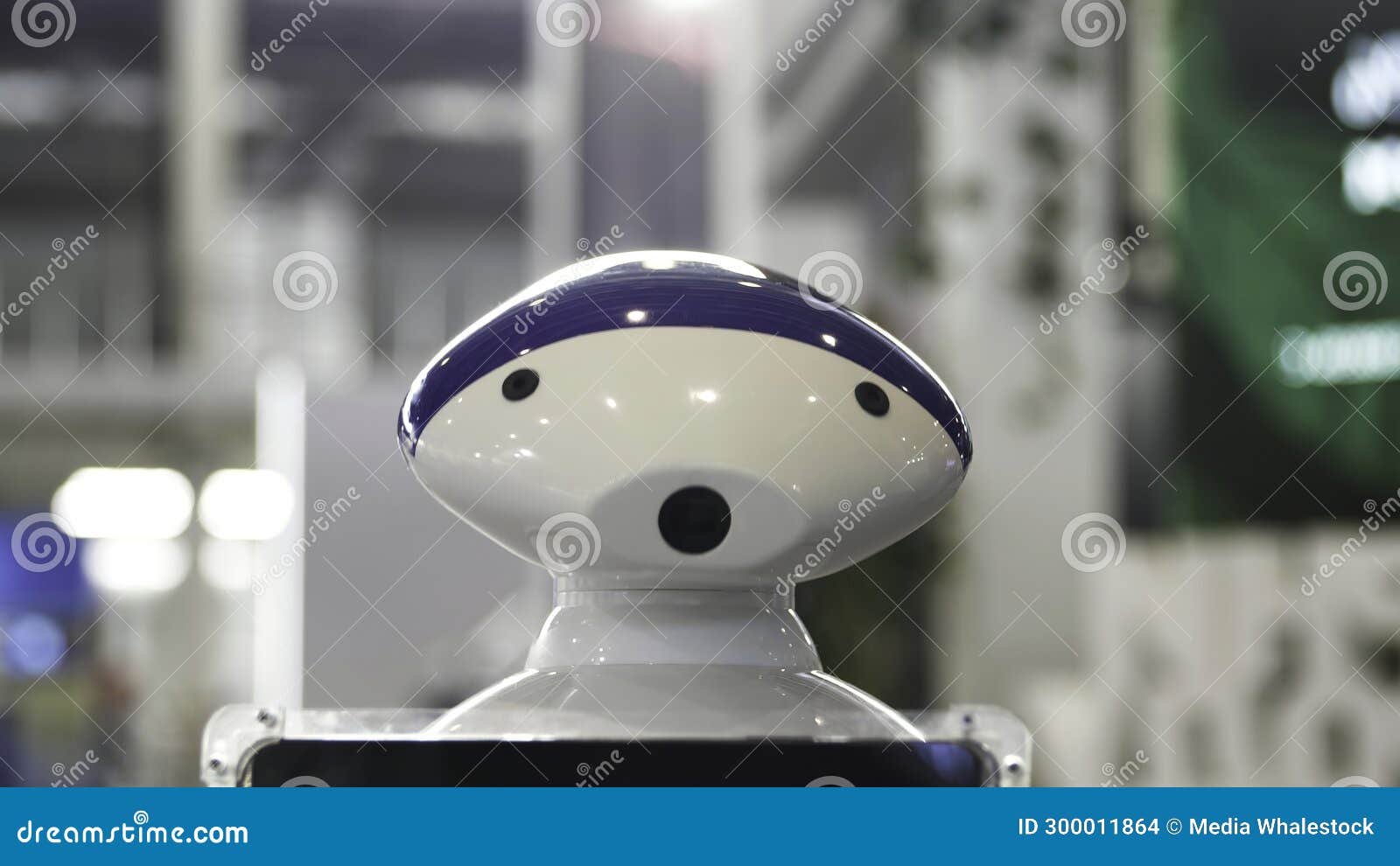 Close Up of the Moving Humanoid Robot with a Camera on His Head. Media ...