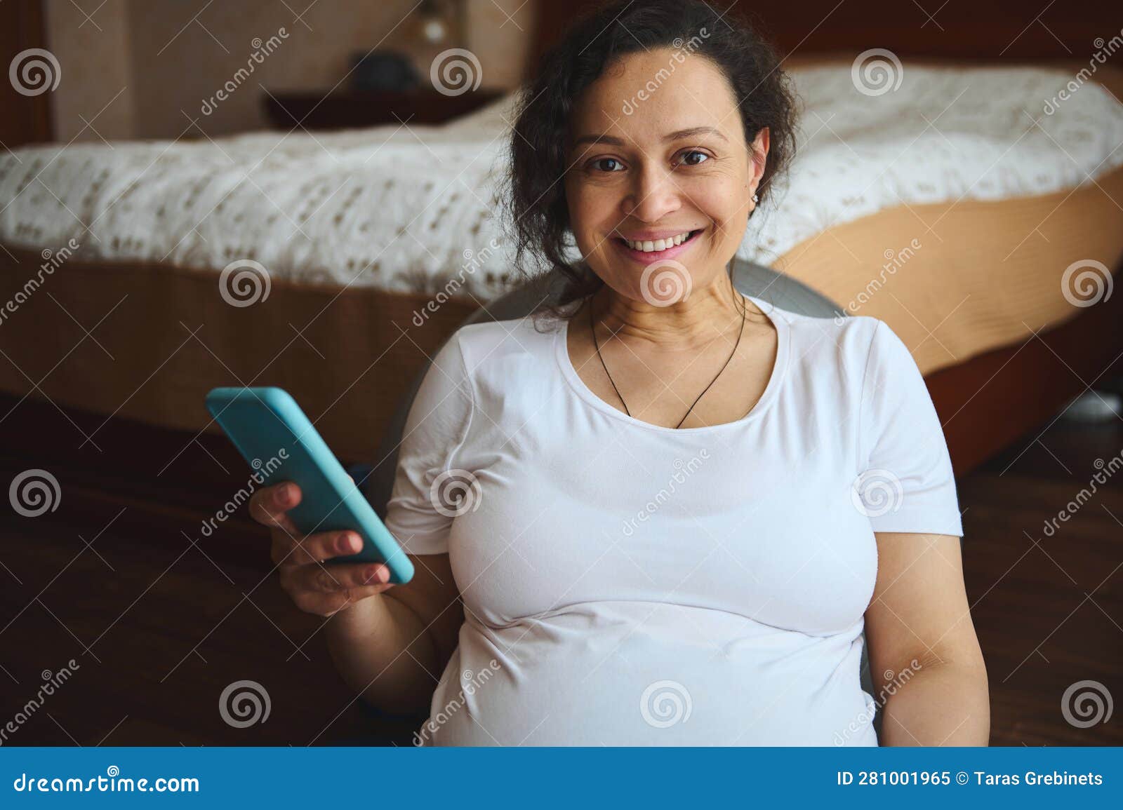 Close Up Multi Ethnic Happy Adult Pregnant Woman Holding Smartphone