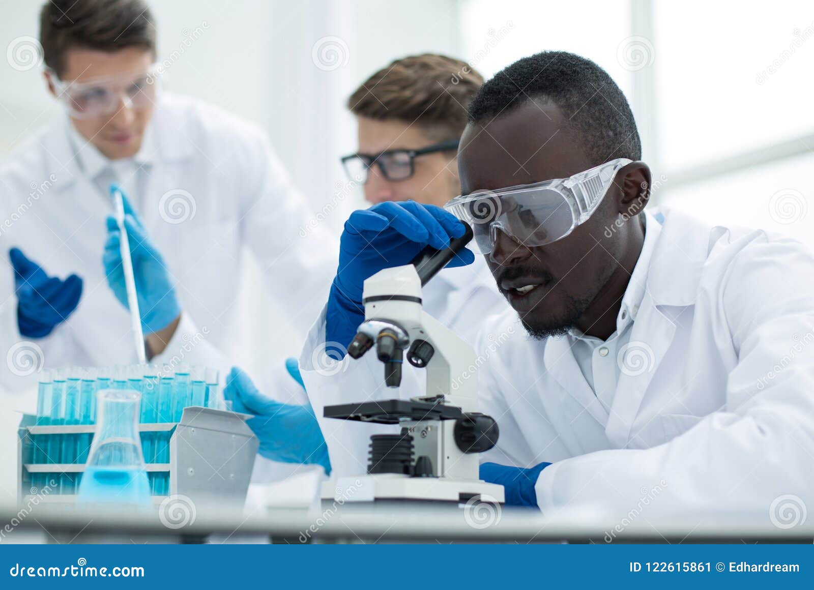Close Up.a Multinational Group of Scientists is Conducting Research ... Close Up.a Multinational Group of Scientists is Conducting Research ...