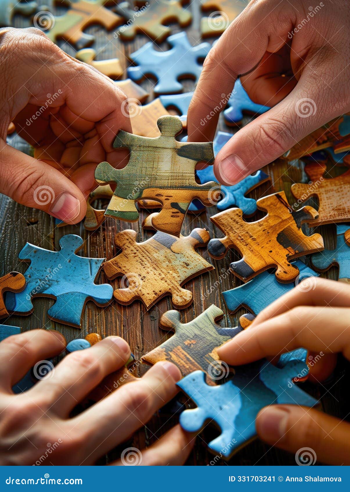 Close-up of Multiple Hands Collaborating To Assemble a Wooden Jigsaw ...