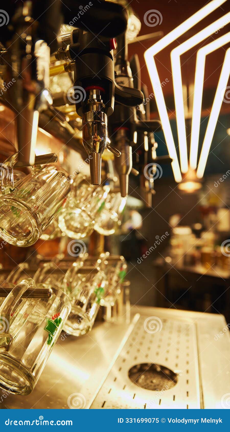 Close-up of Multiple Shiny Beer Taps with Handless, Set Against Blurred ...