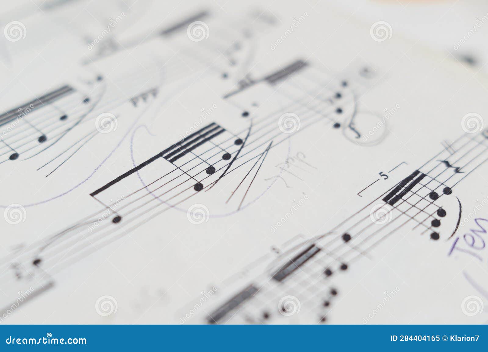 Close Up of Musical Notation and Musical Notes on a Sheet of Paper ...