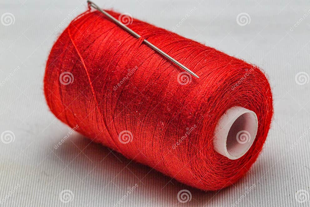 Close Up of Needle and Red Thread Stock Image - Image of background ...