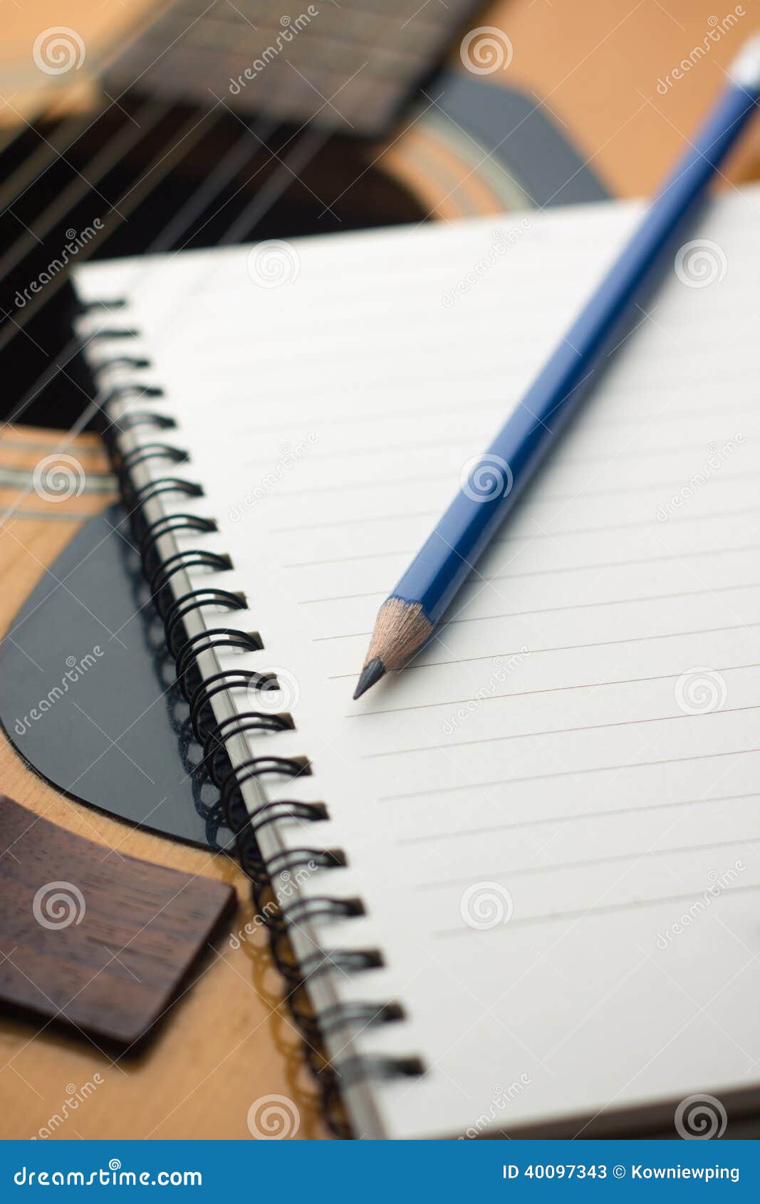 Close-up Notebook and Pencil on Guitar Stock Image - Image of light ...
