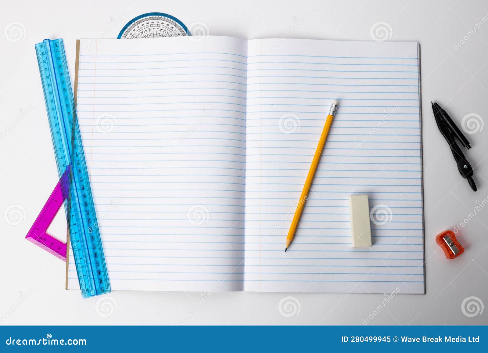 Close Up of Notebook with Rulers and Writing Material on White ...