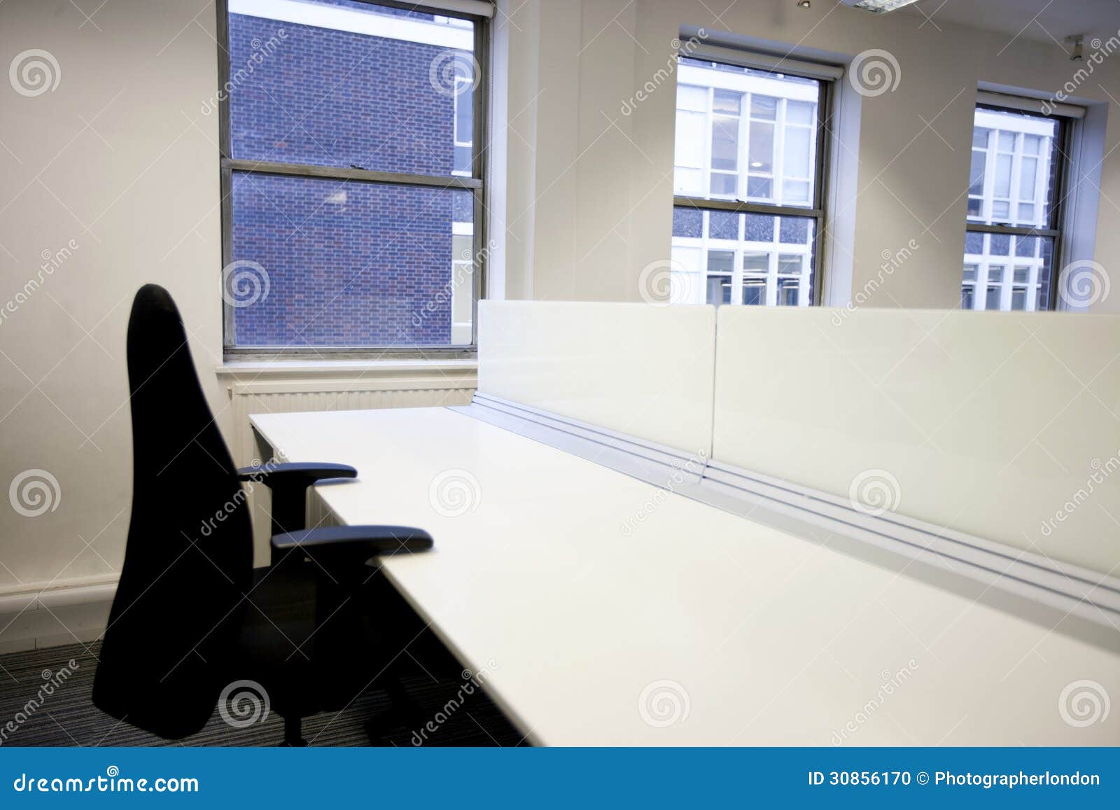 Close Up of Office Chair and Empty Desk by Window Stock Photo - Image ...