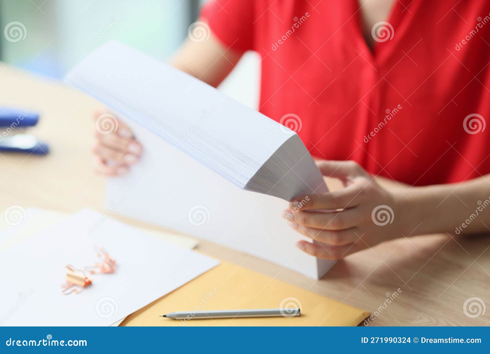 Close-up of Office Manager Holding Stack of Blank Paper while Sitting ...