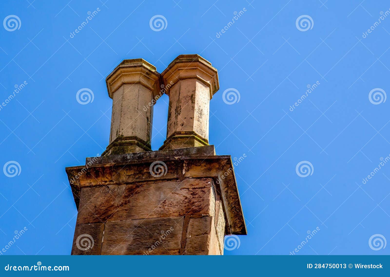 Close-up of an Old Chimney Standing Against a Bright, Blue Sky Stock ...
