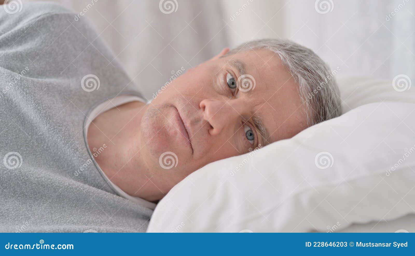 Close Up of Old Man Awake in Bed Thinking Stock Image - Image of ...