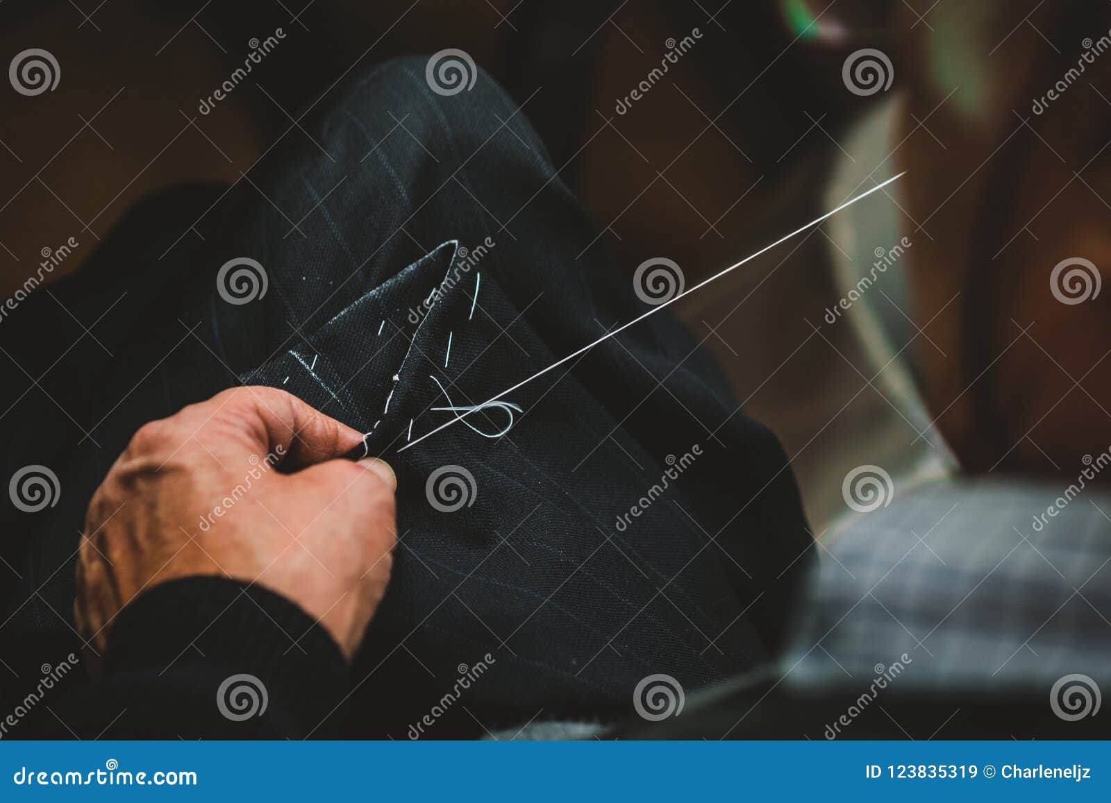 Close-up of Old Man Tailoring Custom Suit with Thread Editorial Stock ...