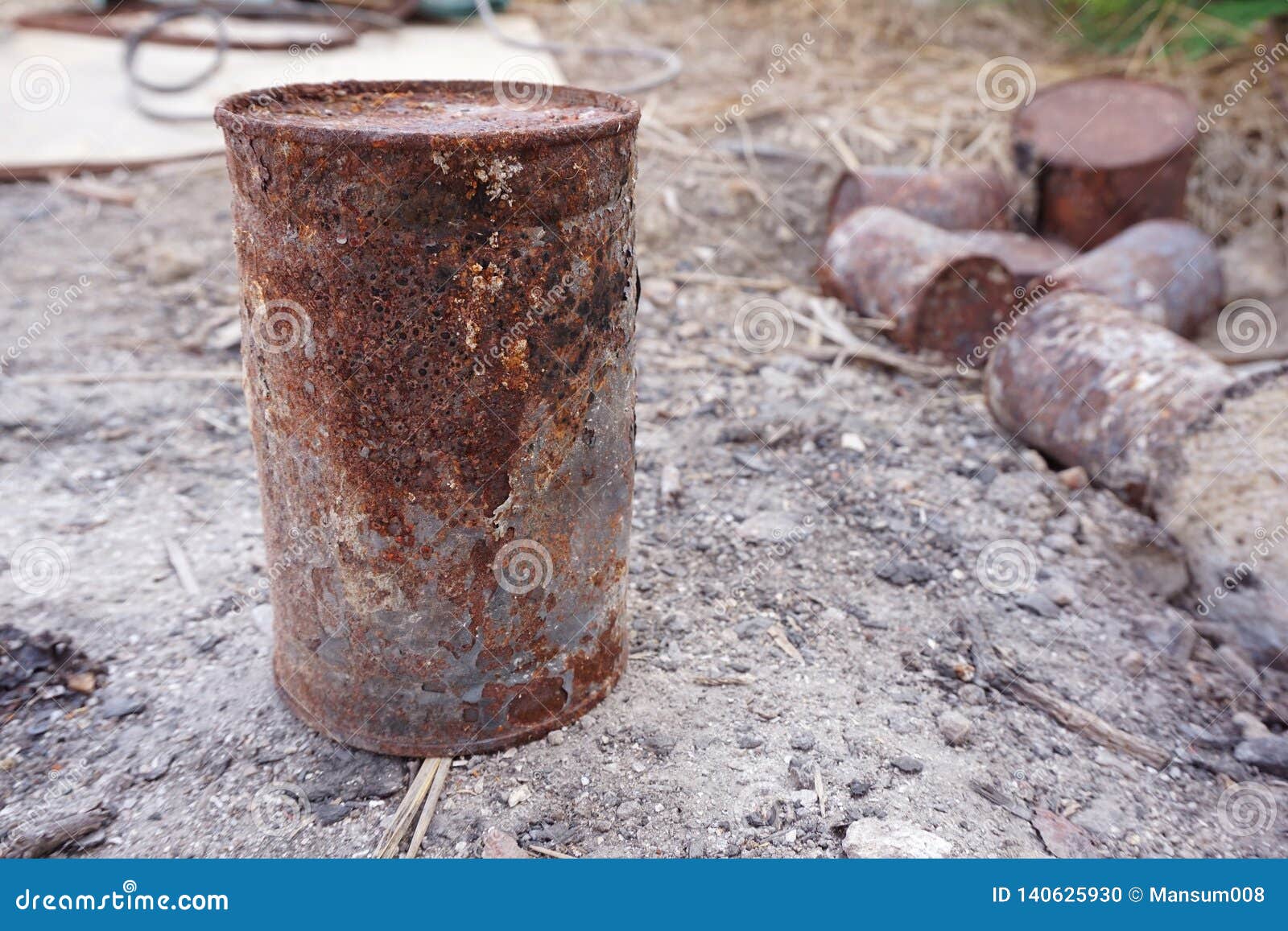 Old Rusty Can on the Ground Stock Photo - Image of ground, used: 140625930