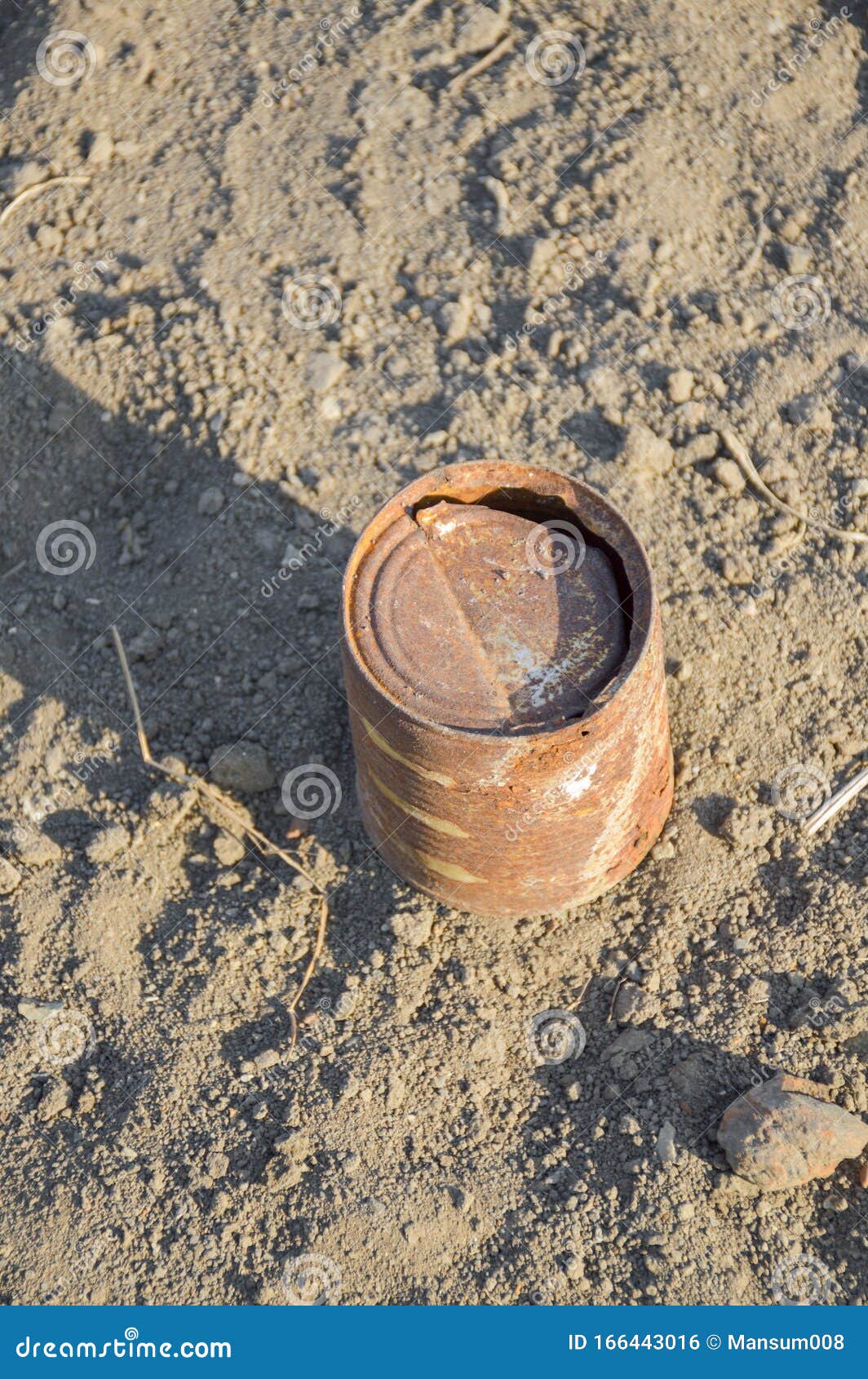 Old Rusty Can on the Ground Stock Photo - Image of dirty, ground: 166443016