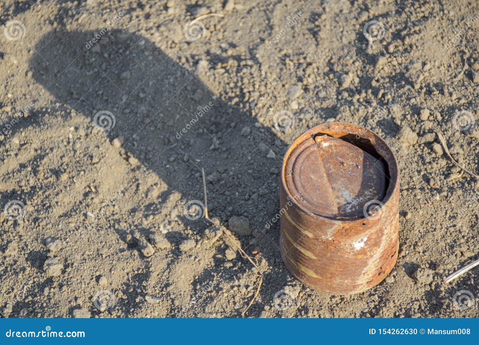 Old Rusty Can on the Ground Stock Photo - Image of grass, steel: 154262630