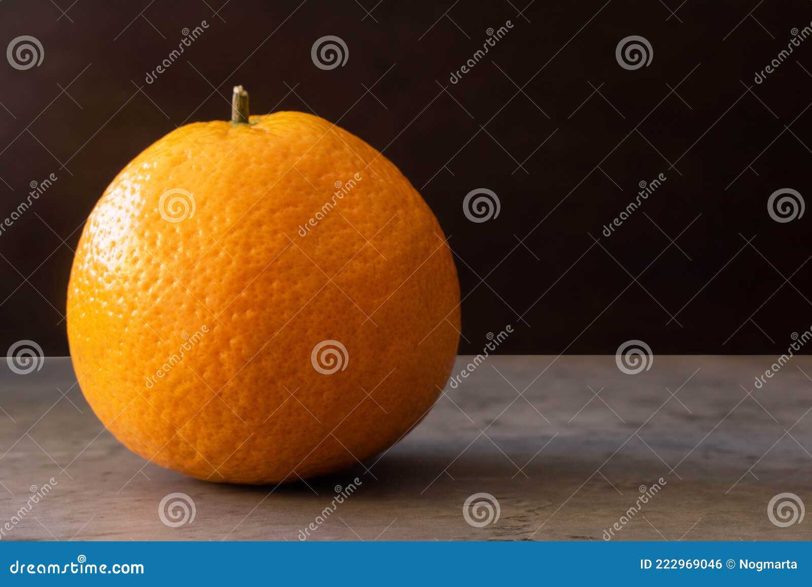 One Orange Resting on Counter Stock Photo - Image of delicious ...