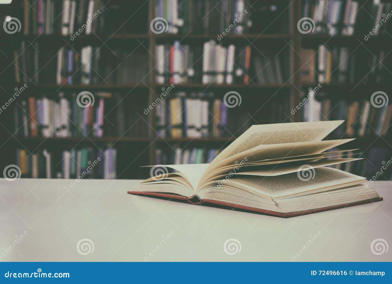 Close Up of Open Book on Desk with Vintage Filter Blur Background Stock ...