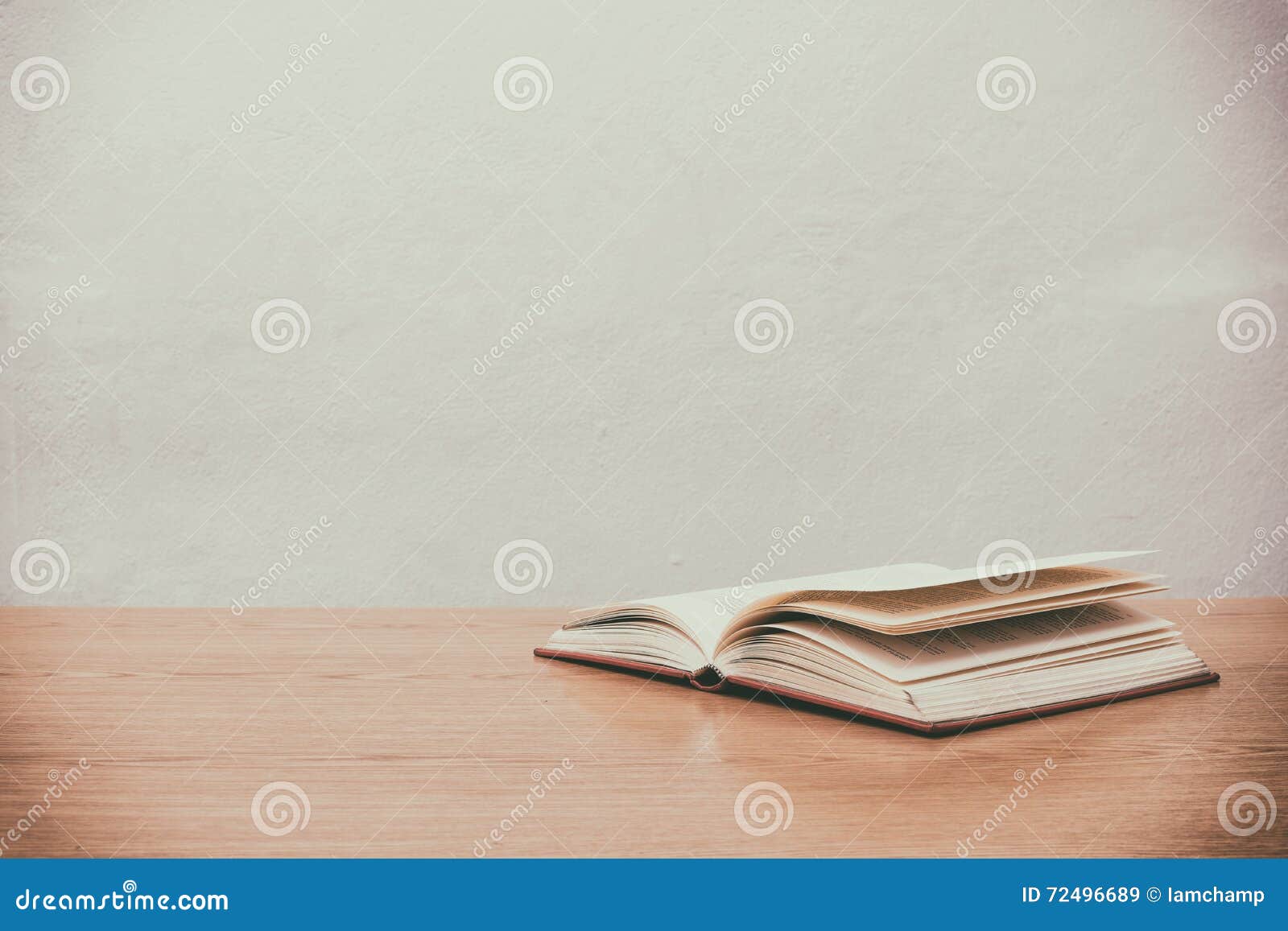 Close Up of Open Book on Desk with Vintage Filter Blur Background Stock ...