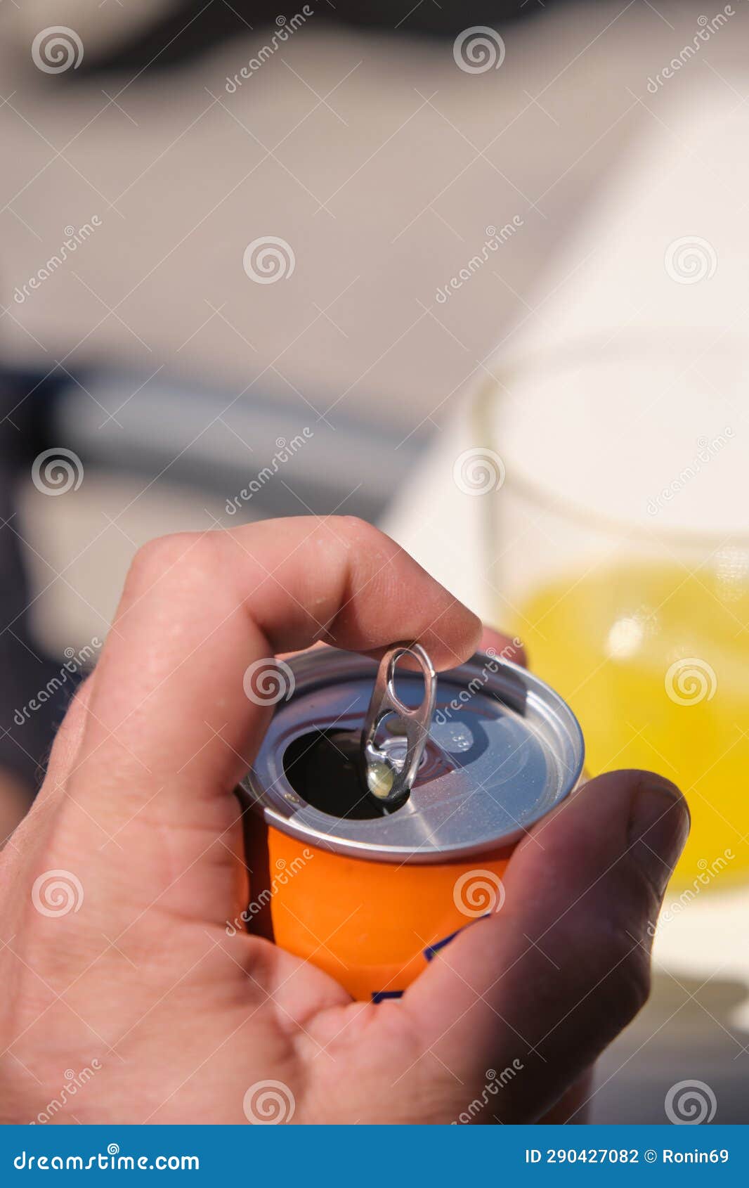An Open Can of a Drink in Hand Stock Photo - Image of body, metallic ...