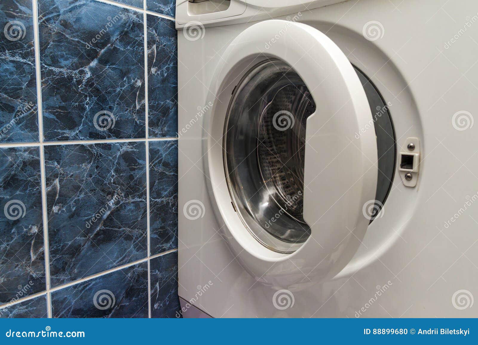 A Close Up of Open Washing Machine in Bathroom Stock Photo - Image of ...