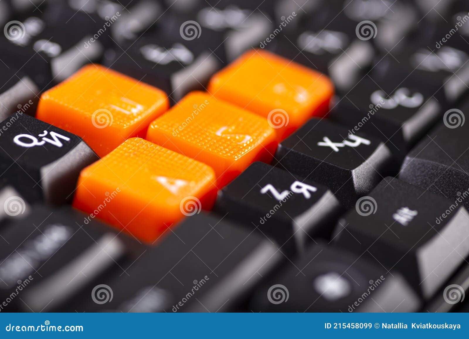 Close-up of Orange Arrow Keys on a Black Keyboard, Up, Down, Left ...