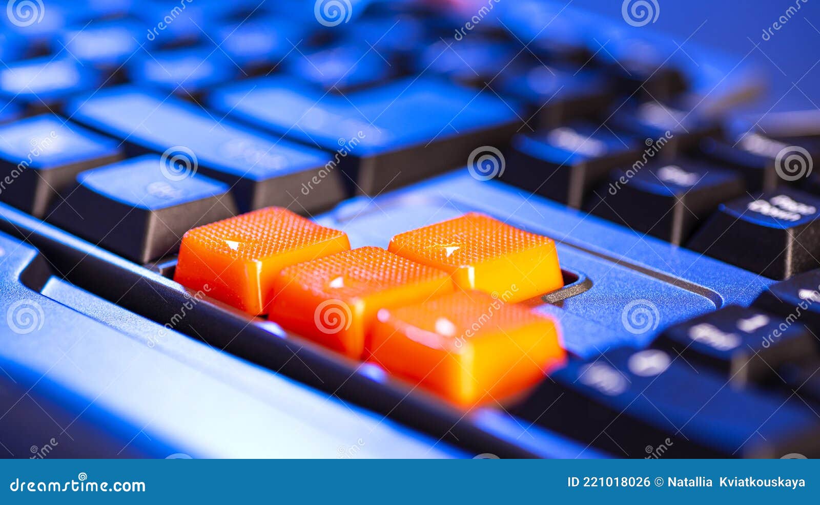 Close-up of Orange Arrow Keys on a Black Keyboard, Up, Down, Left ...