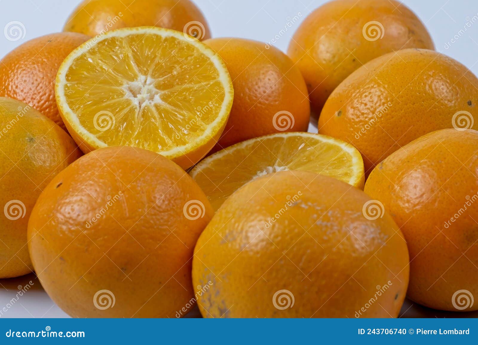 Close Up of Orange Halves with Uncut Oranges Stock Photo - Image of ...