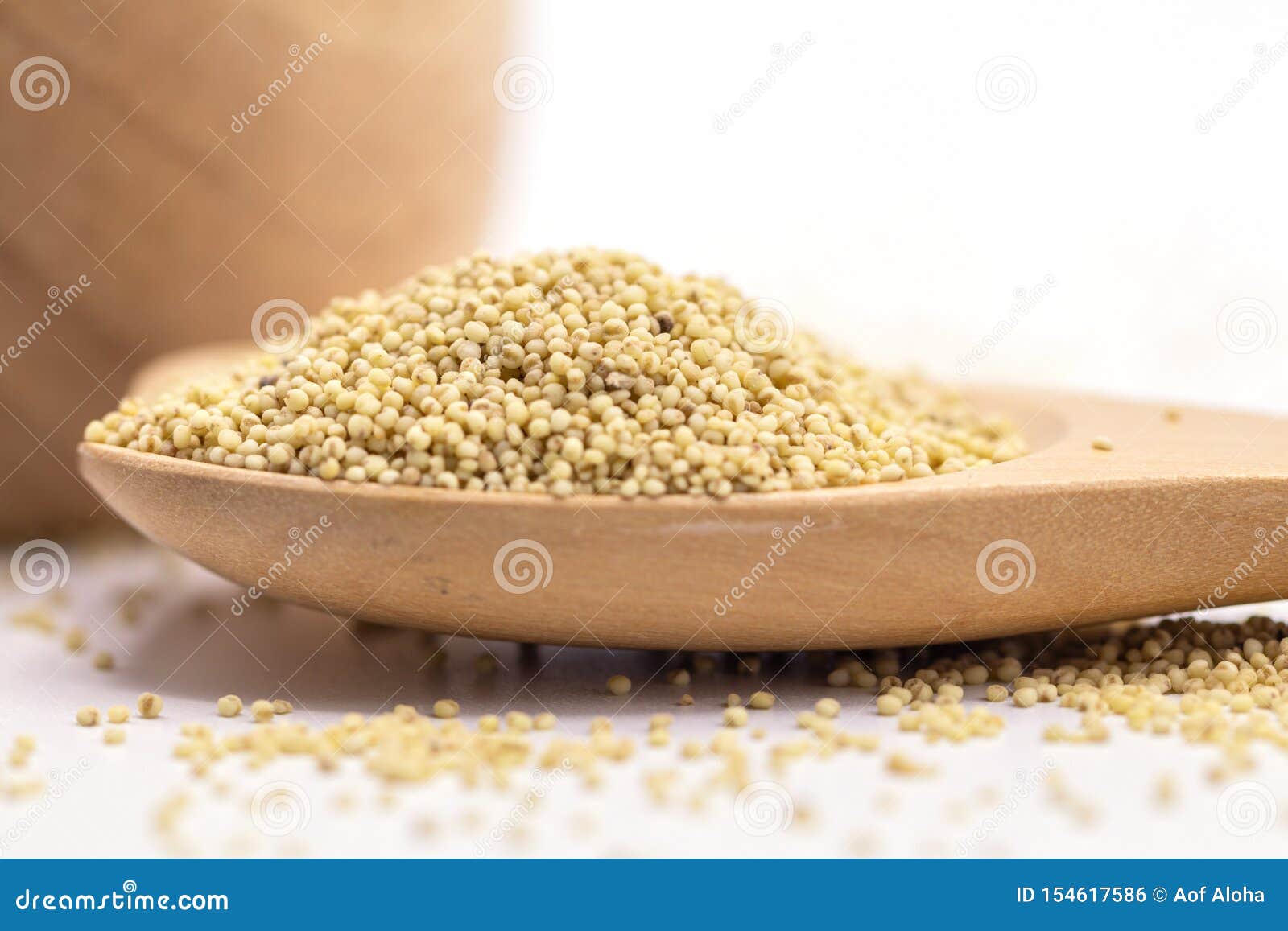 Organic Healthy Millet in Spoon Isolate on White Background. Stock ...