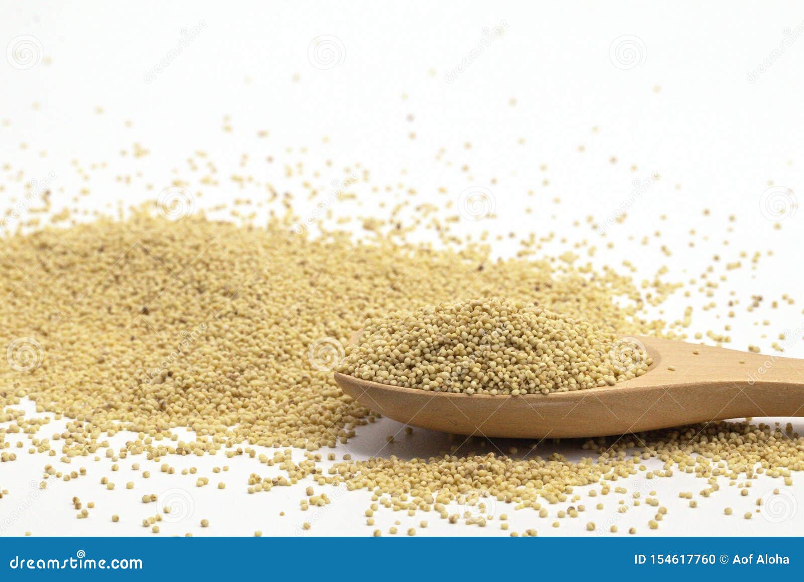 Organic Healthy Millet in Spoon Isolate on White Background. Stock ...