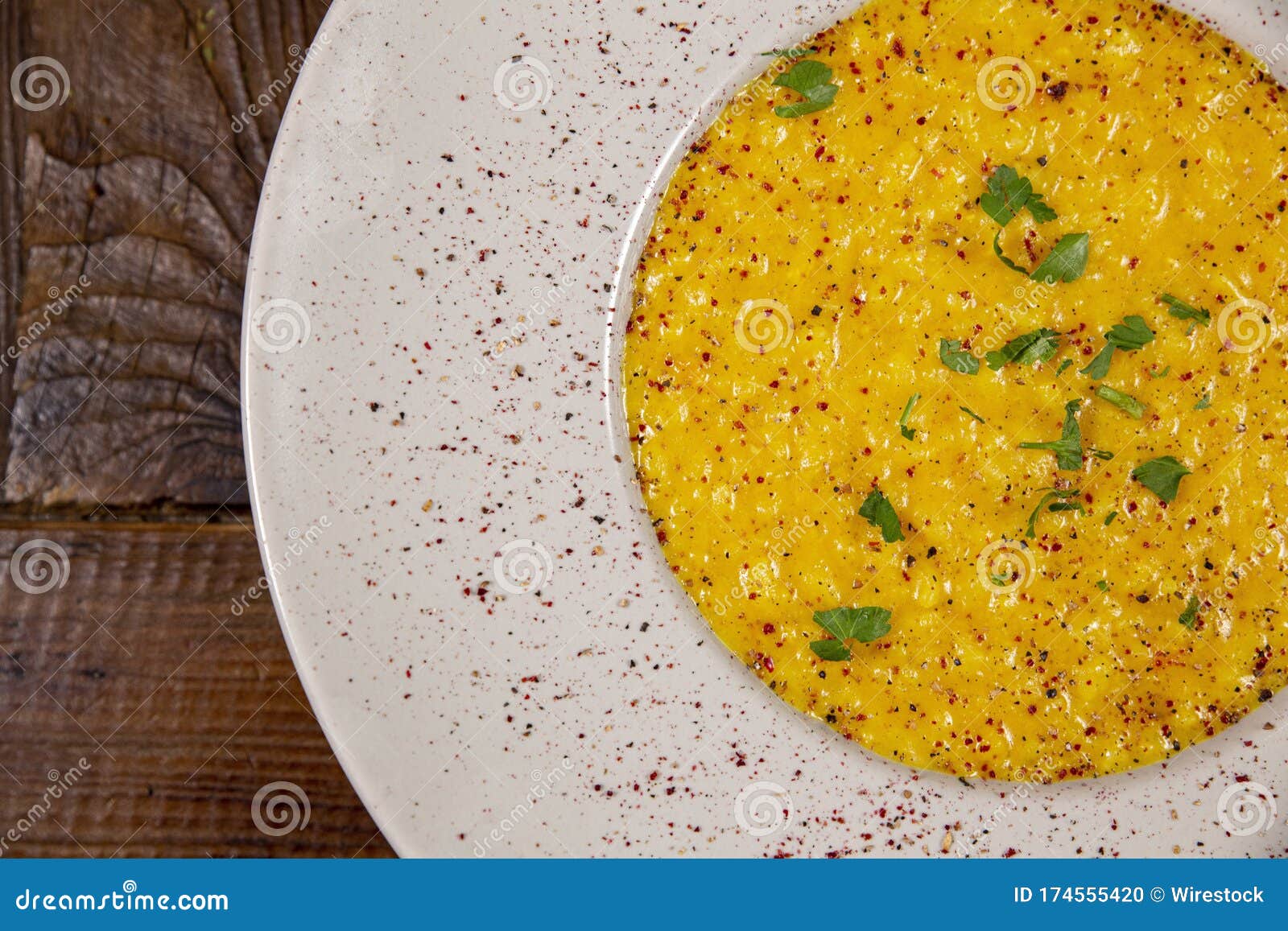 Close Up and Over a Plate of Risotto with Saffron, White Plate on a ...