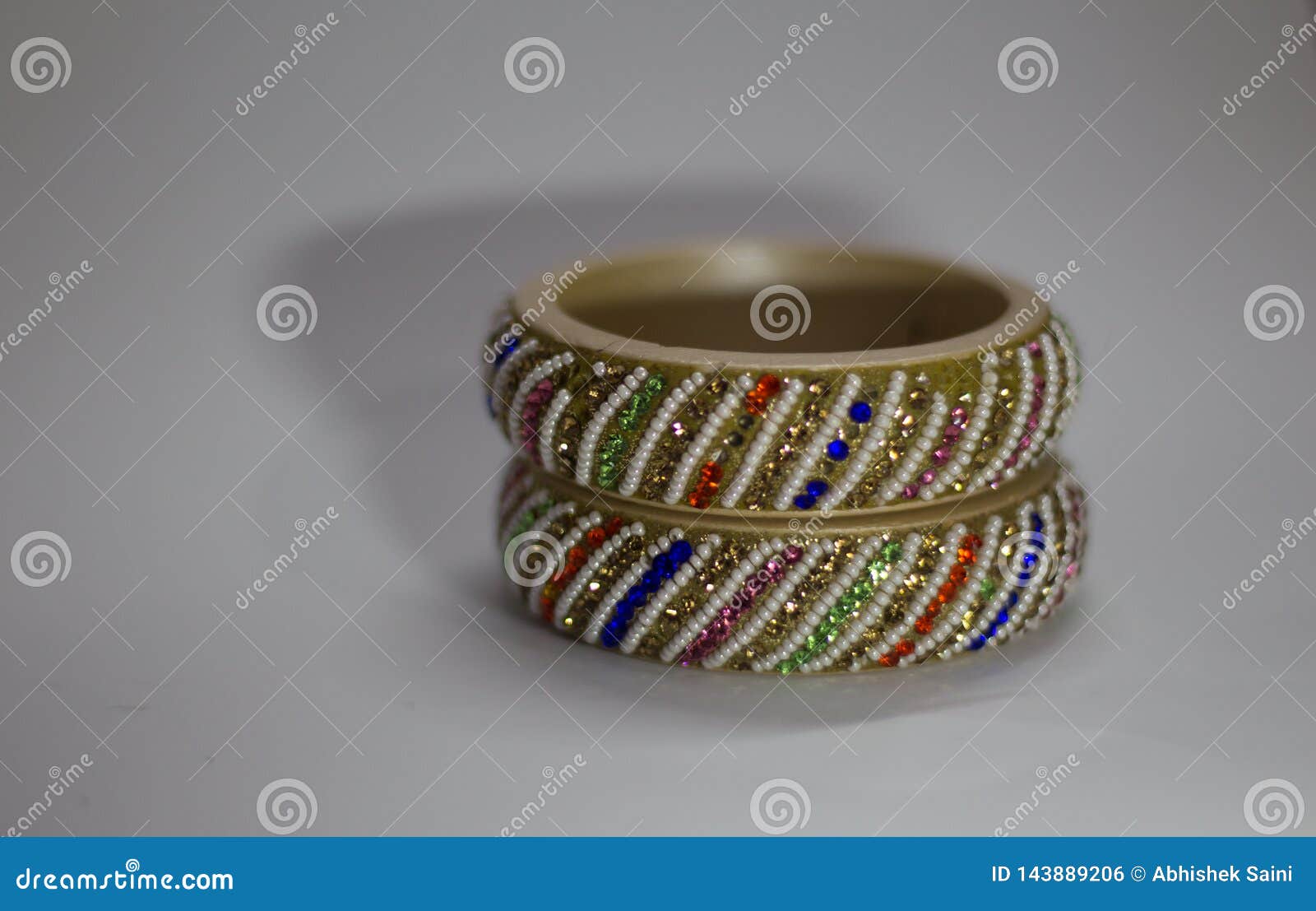 Close Up of Pair of Bangles Isolated on White Background with Space for ...